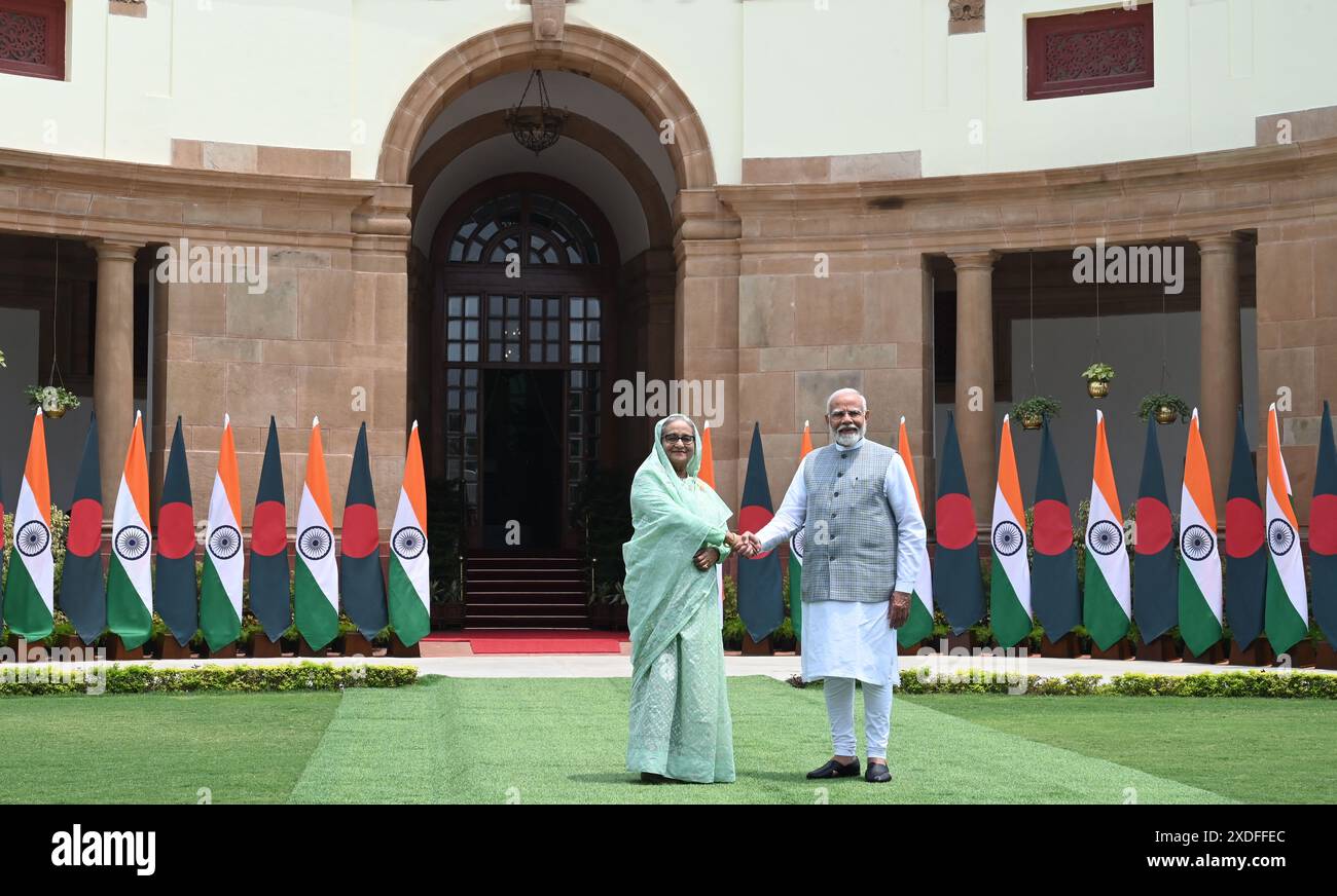 NEW DELHI, INDIA - JUNE 22: Prime Minister Narendra Modi, with his Bangladeshi counterpart ...