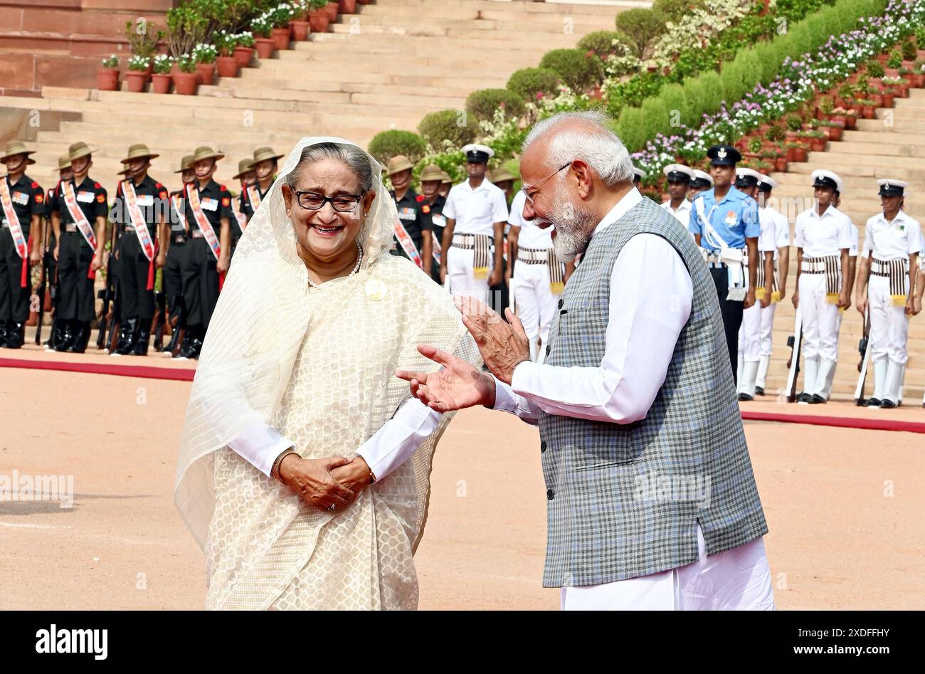 NEW DELHI, INDIA - JUNE 22: Prime Minister Narendra Modi, right, talks with his Bangladeshi ...