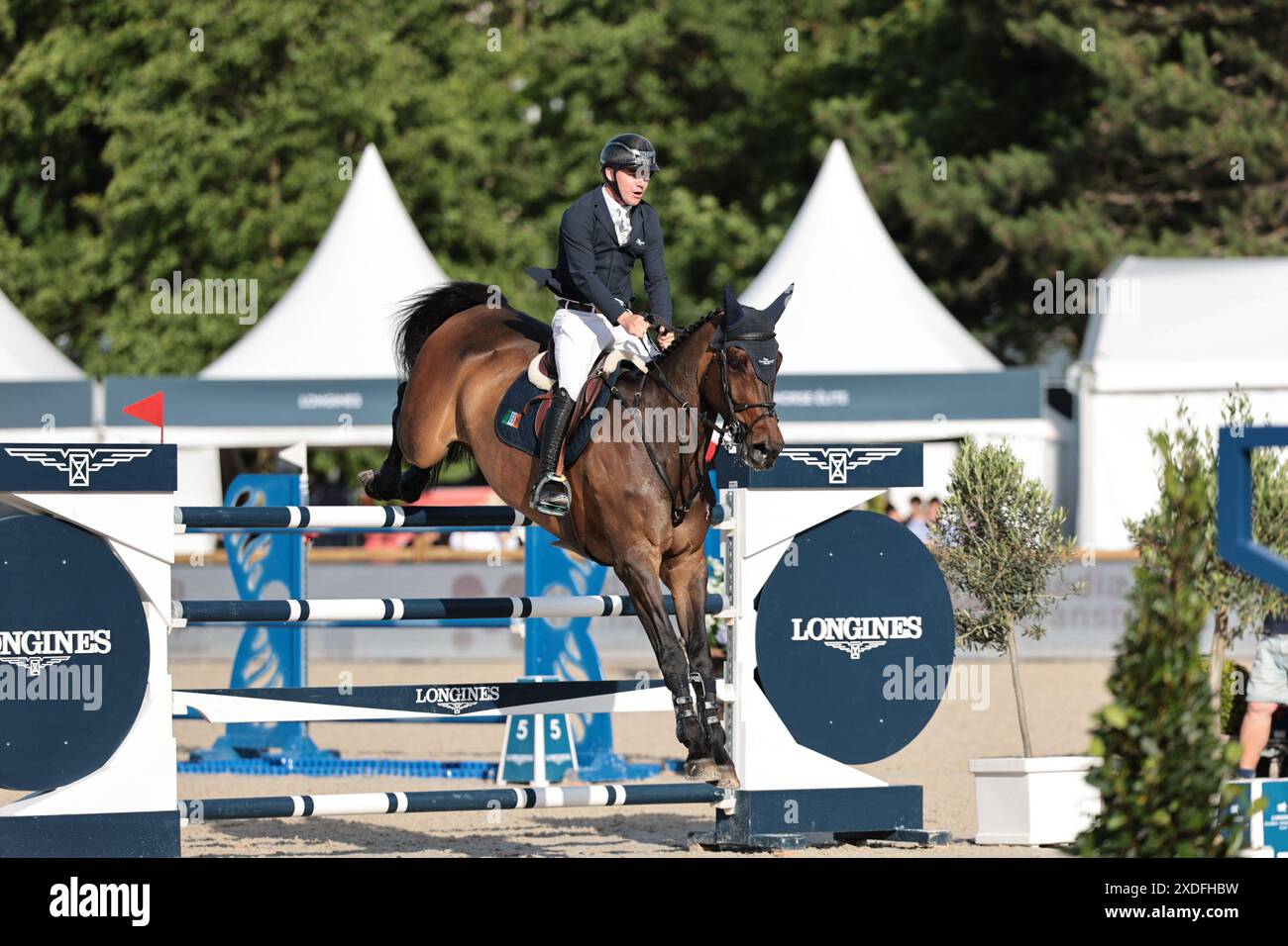 Michael Pender of Ireland with HHS Calais during the Longines Global ...