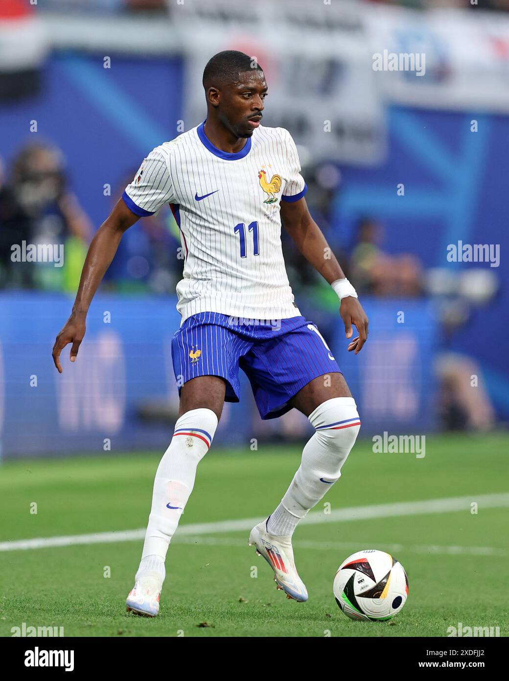LEIPZIG, GERMANY - JUNE 21: Ousmane Dembele of France runs with a ball ...