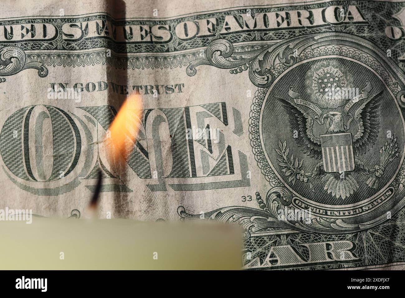 dollar inflation concept, 1 dollar banknote against candle on fire, US ... dollar inflation concept, 1 dollar banknote against candle on fire, US ...