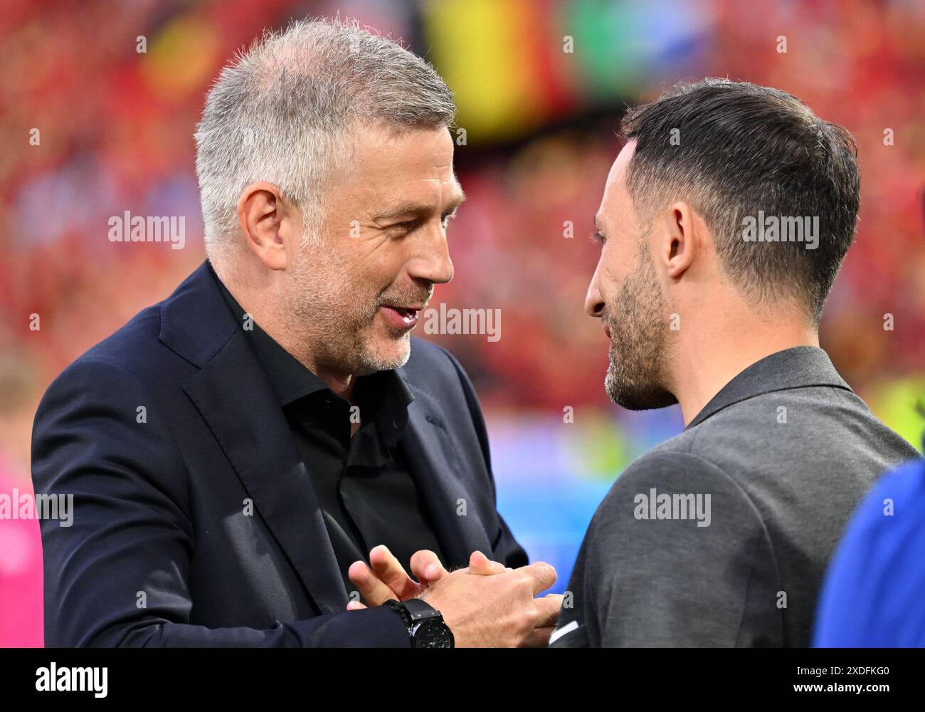 Cologne, Germany. 22nd June, 2024. Romania coach Edward Iordanescu (L ...