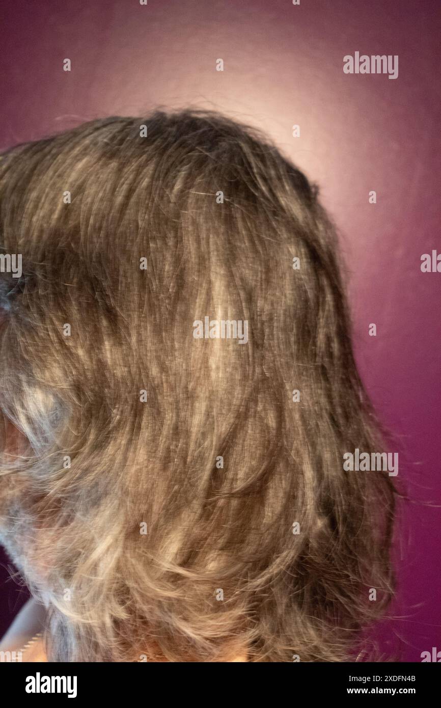 Long hair man profile hi-res stock photography and images - Alamy