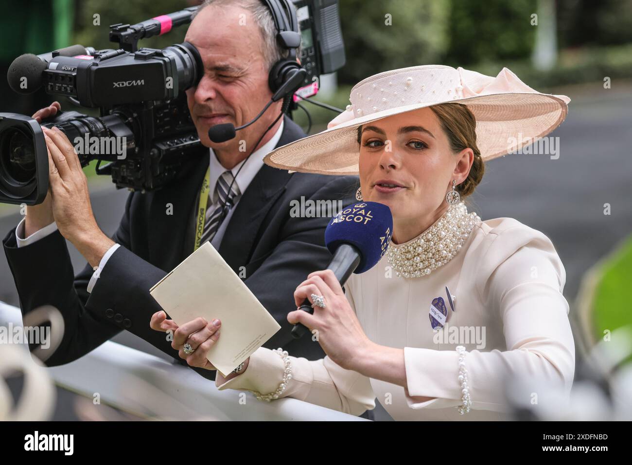 Rosie Tapner, model and tv presenter, in hat and dress presenting at ...