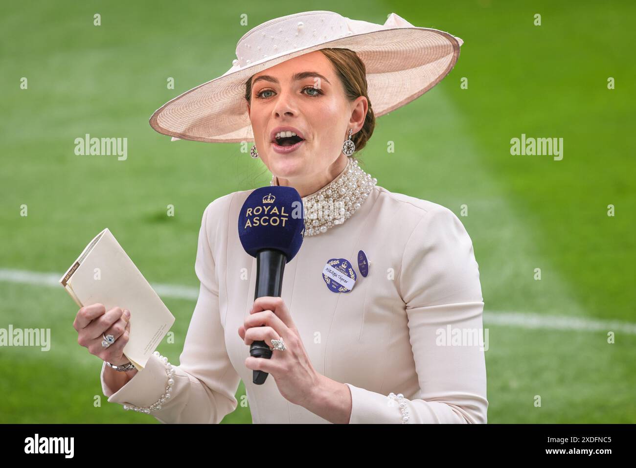 Rosie Tapner, model and tv presenter, in hat and dress presenting at ...