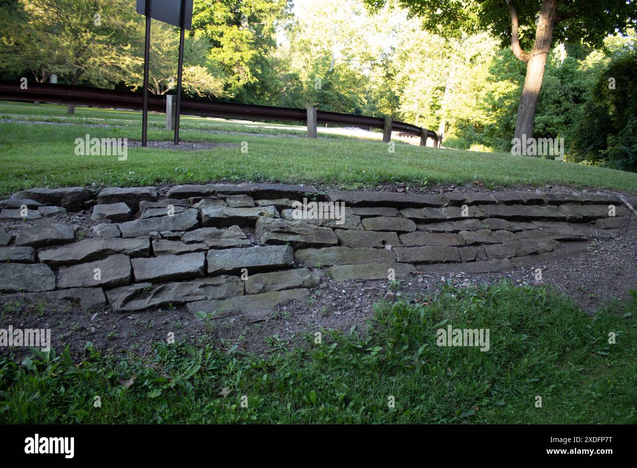 Brick wall branches road hi-res stock photography and images - Alamy