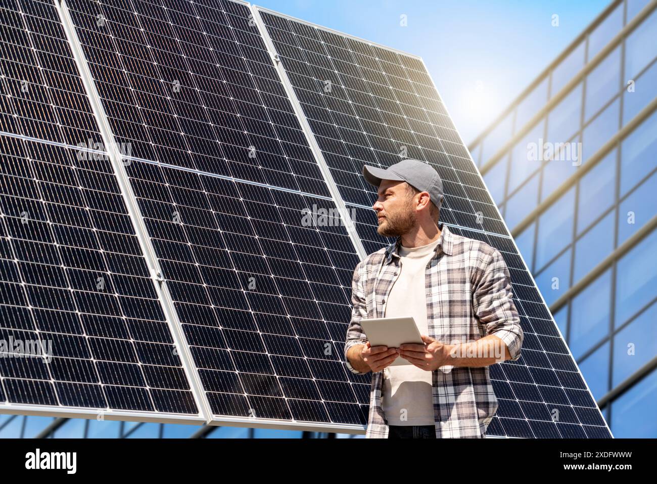 Installation of solar panels on business and office buildings in cities ...