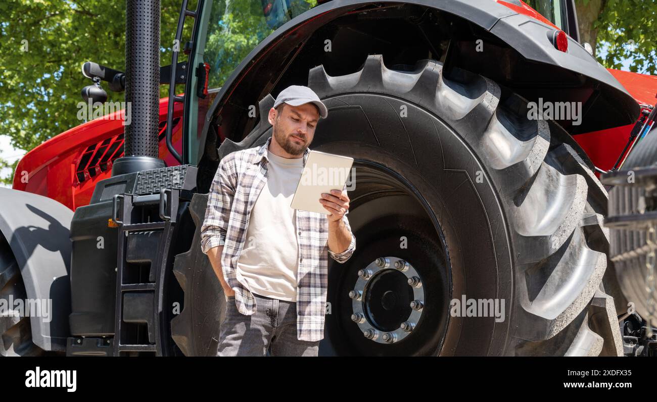 Farmer checks online the specifications and technical characteristics ...