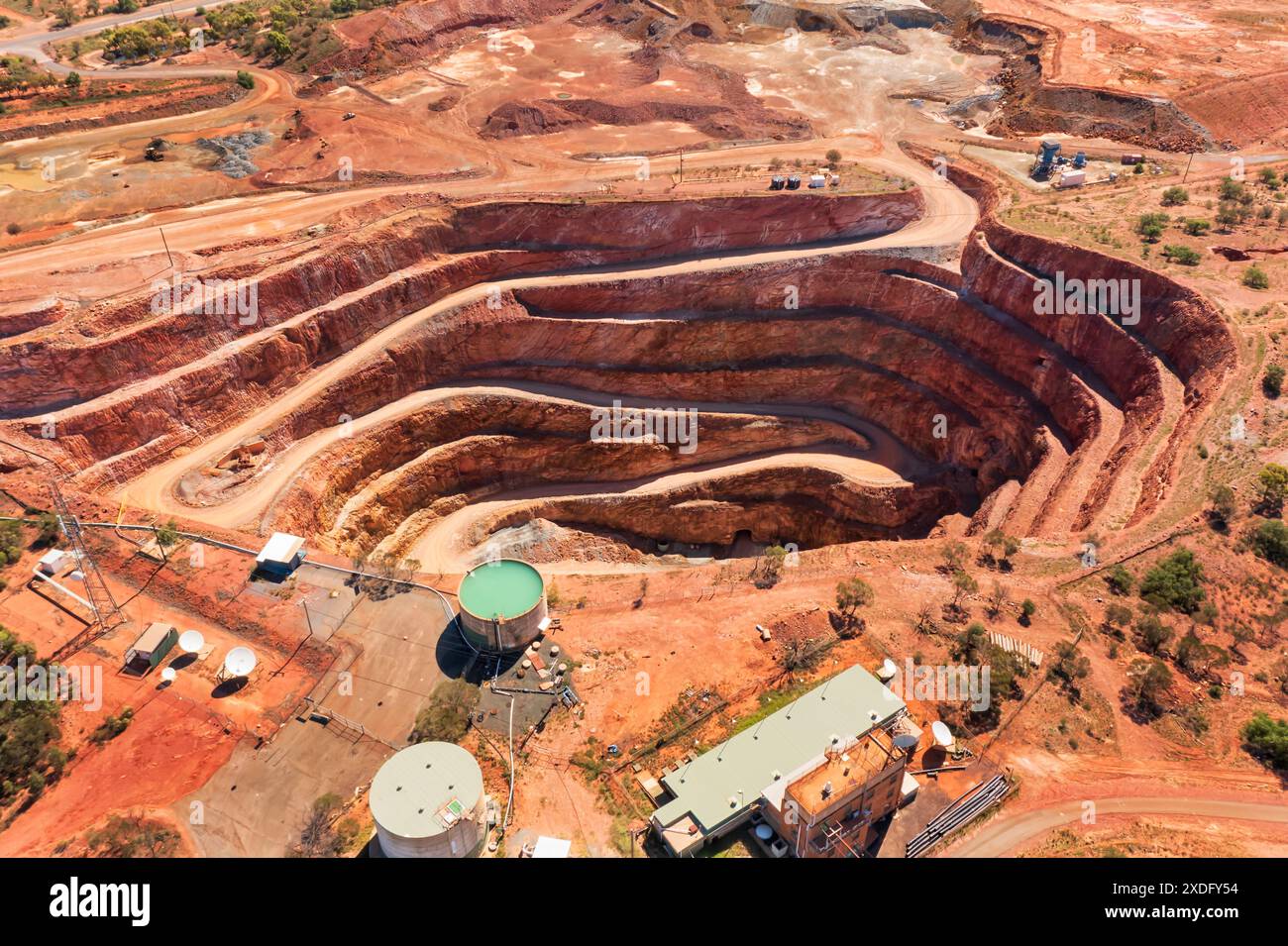Layered deep open pit copper mine in Cobar town of Australia - aerial ...