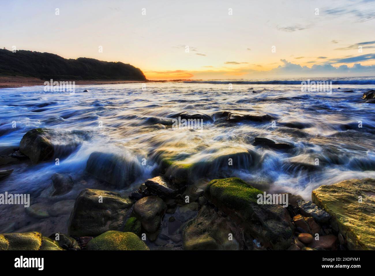 Green moss on rocks of Hams beach in Caves beach town - Pacific coast ...