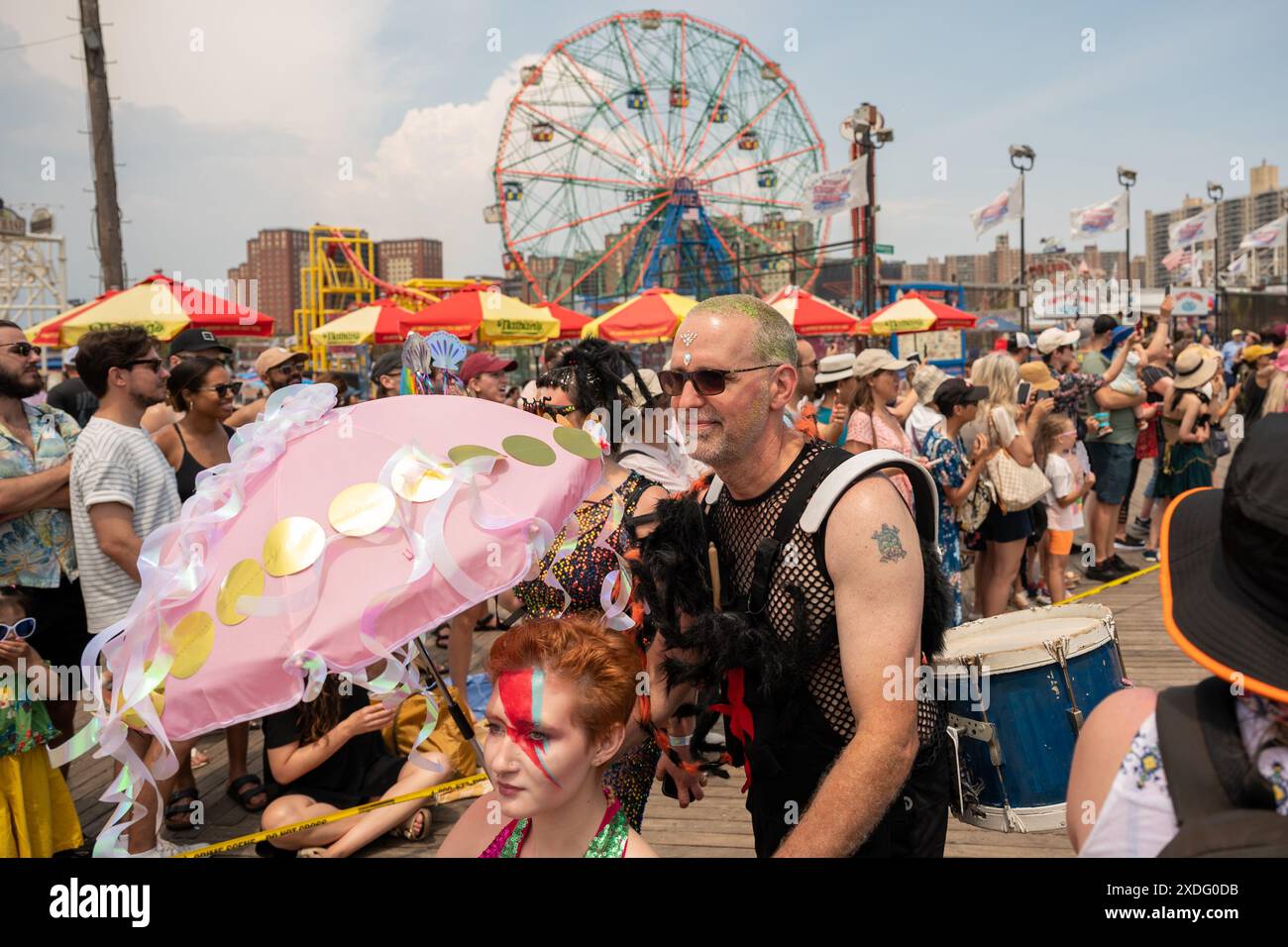 Parade participants march in the 42nd Annual Mermaid Parade in Coney ...