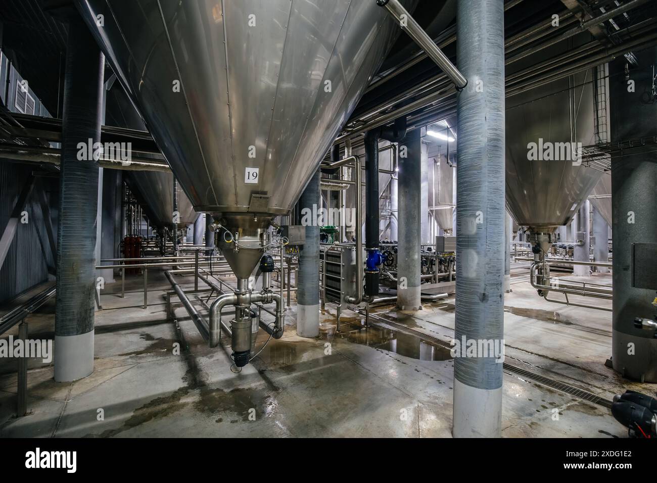 Large industrial stainless steel vats for fermentation in modern ...