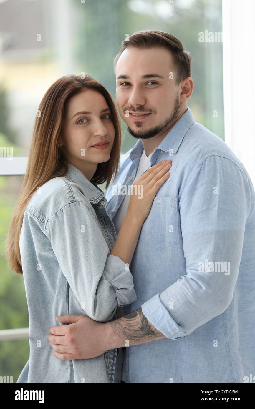 Cute couple hugging at home. Strong relationship Stock Photo - Alamy