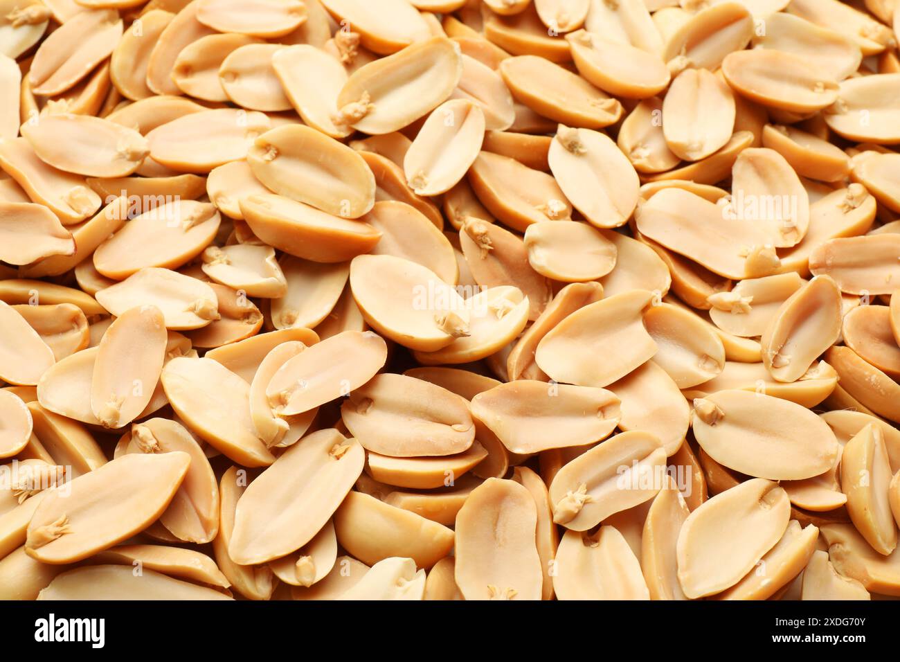 Fresh peeled peanuts as background, above view Stock Photo - Alamy