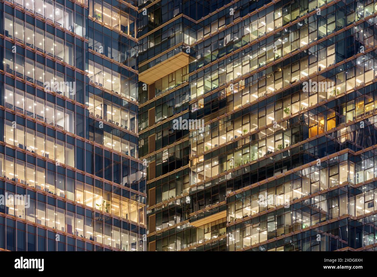 Scenic glowing windows of skyscrapers. Awesome evening view of modern ...