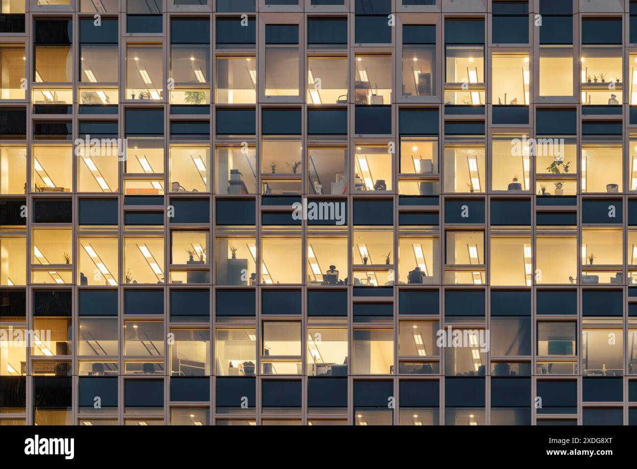 Scenic glowing windows of skyscrapers. Awesome evening view of modern ...
