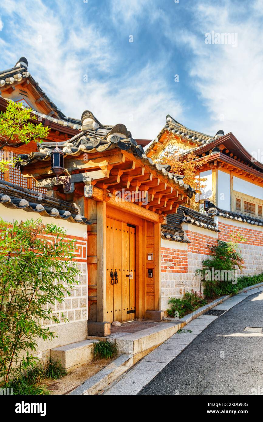 View of cozy old narrow street and traditional Korean houses of Bukchon ...