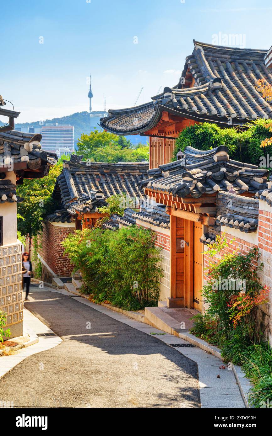 View of cozy old narrow street and traditional Korean houses of Bukchon ...