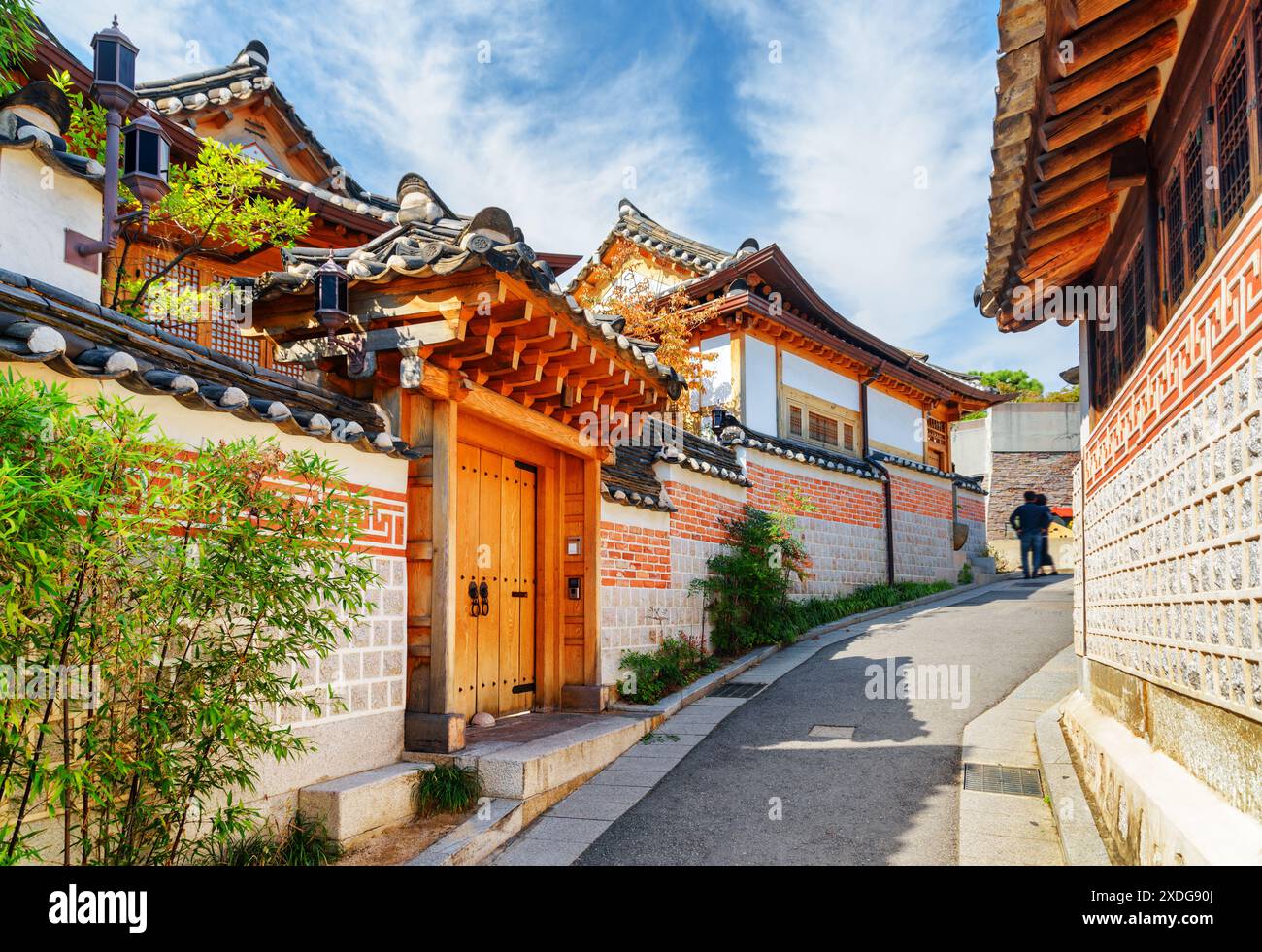 View of cozy old narrow street and traditional Korean houses of Bukchon ...