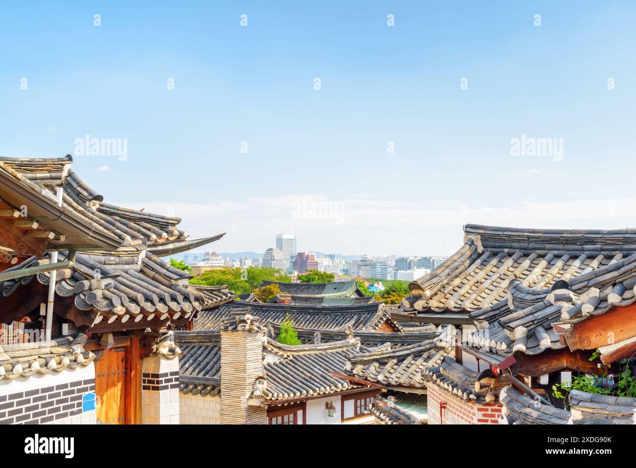 View of cozy old narrow street and traditional Korean houses of Bukchon ...