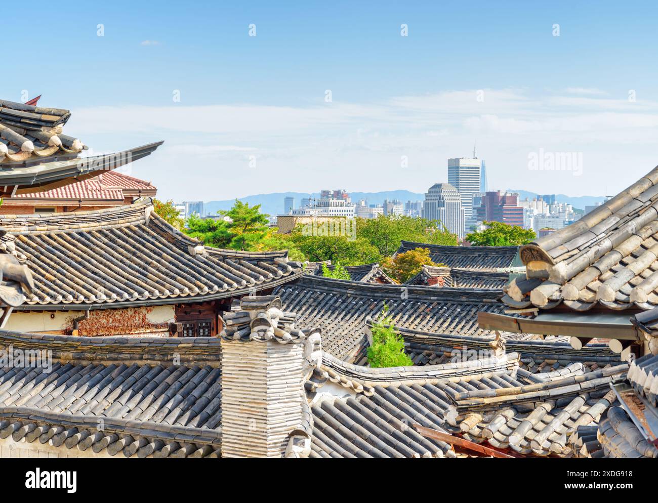 View of cozy old narrow street and traditional Korean houses of Bukchon ...
