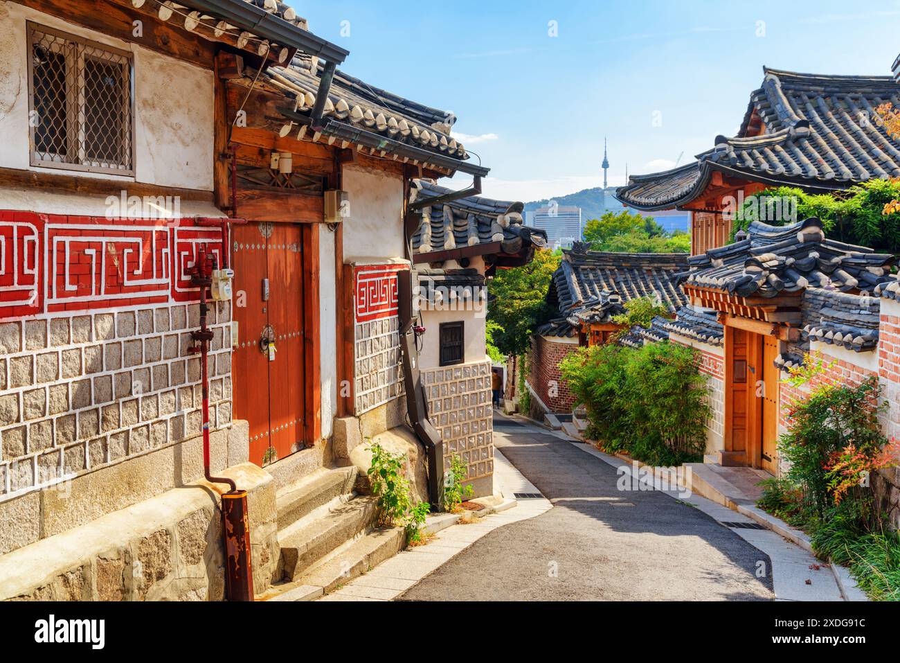 View of cozy old narrow street and traditional Korean houses of Bukchon ...