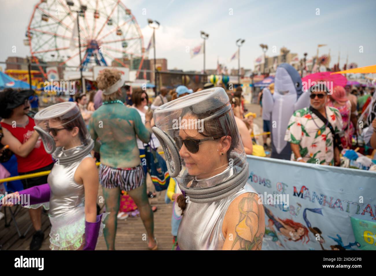 Parade participants march in the 42nd Annual Mermaid Parade in Coney ...