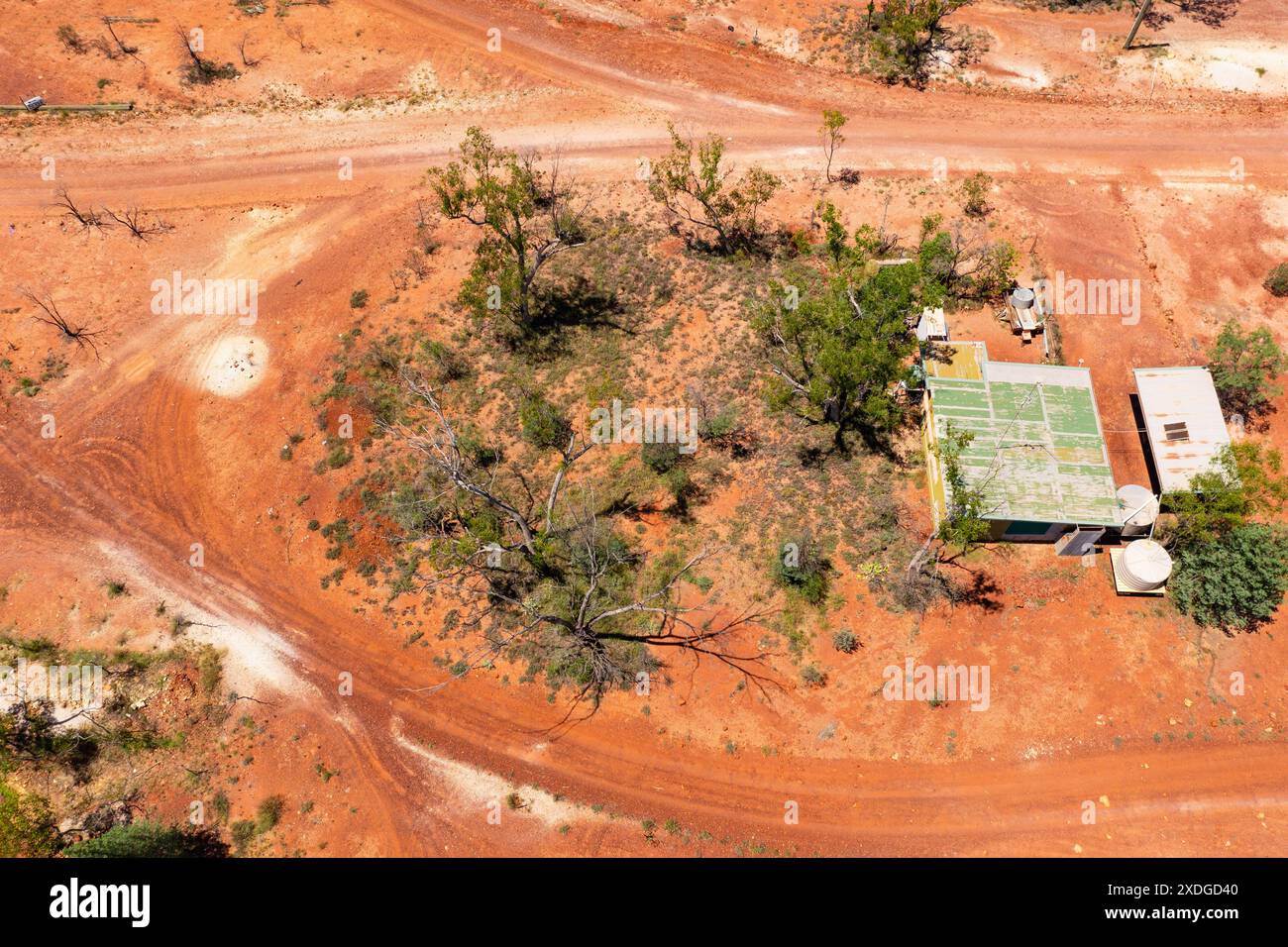 Aerial view of a corructed iron shed in a mining landscape at Lightning ...