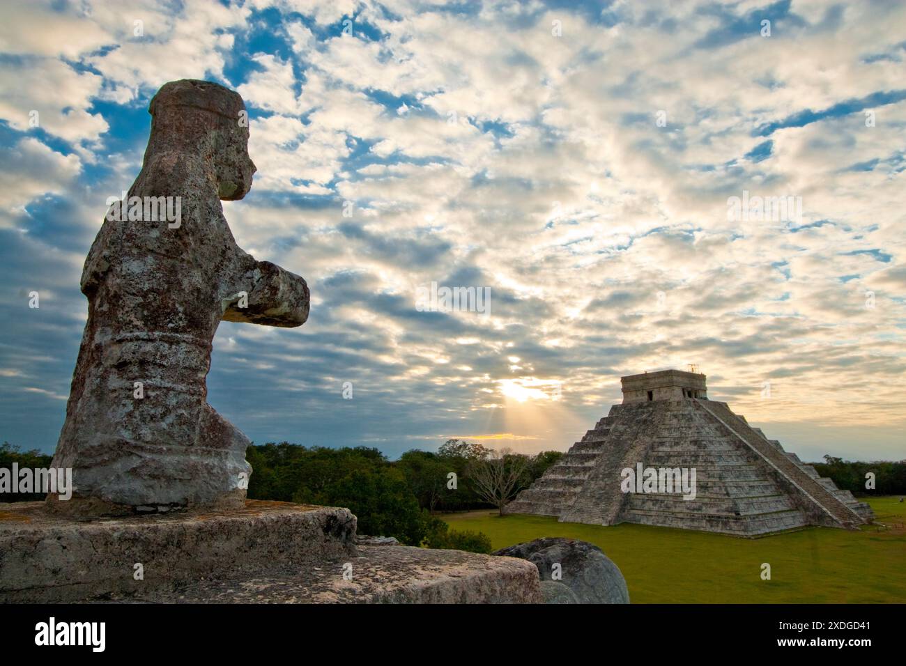 Chichen Itza pyramid nice clouds statue in foreground unusual angle of ...