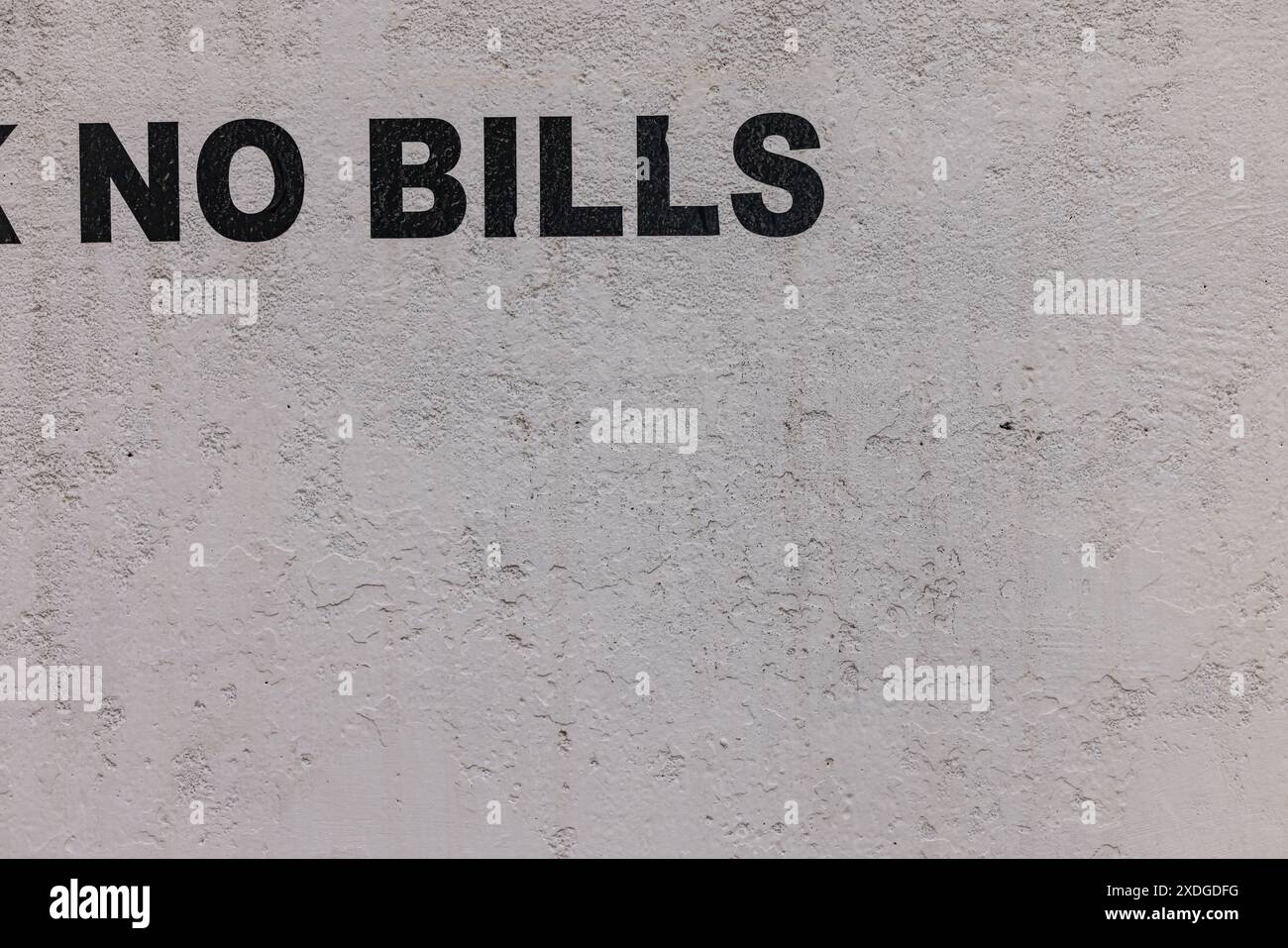 post no bills stenciled sign Stock Photo - Alamy