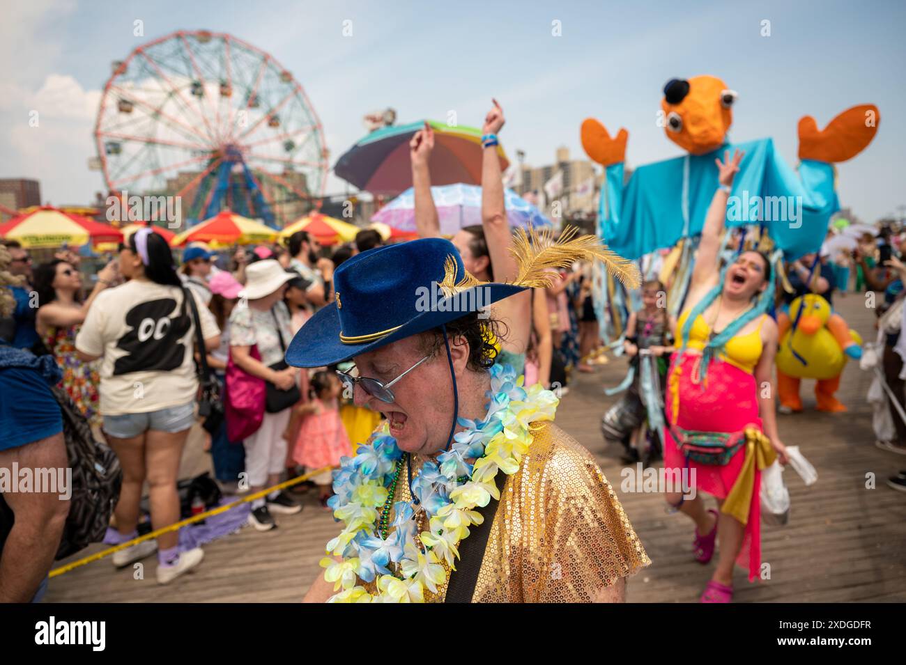 Parade participants march in the 42nd Annual Mermaid Parade in Coney ...