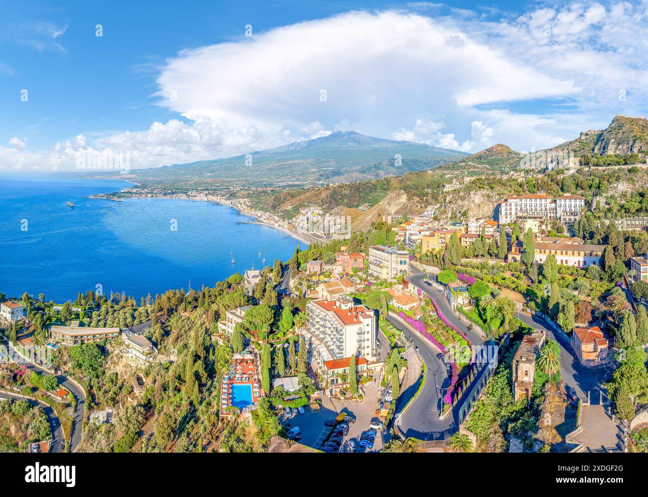 Landscape with Etna volcano and Taormina town aerial panoramic view ...