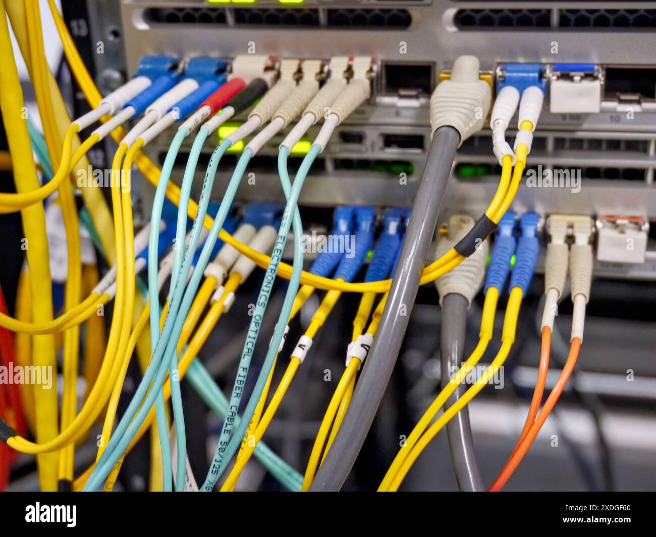 Communication equipment connected with copper and optical cables Stock ...