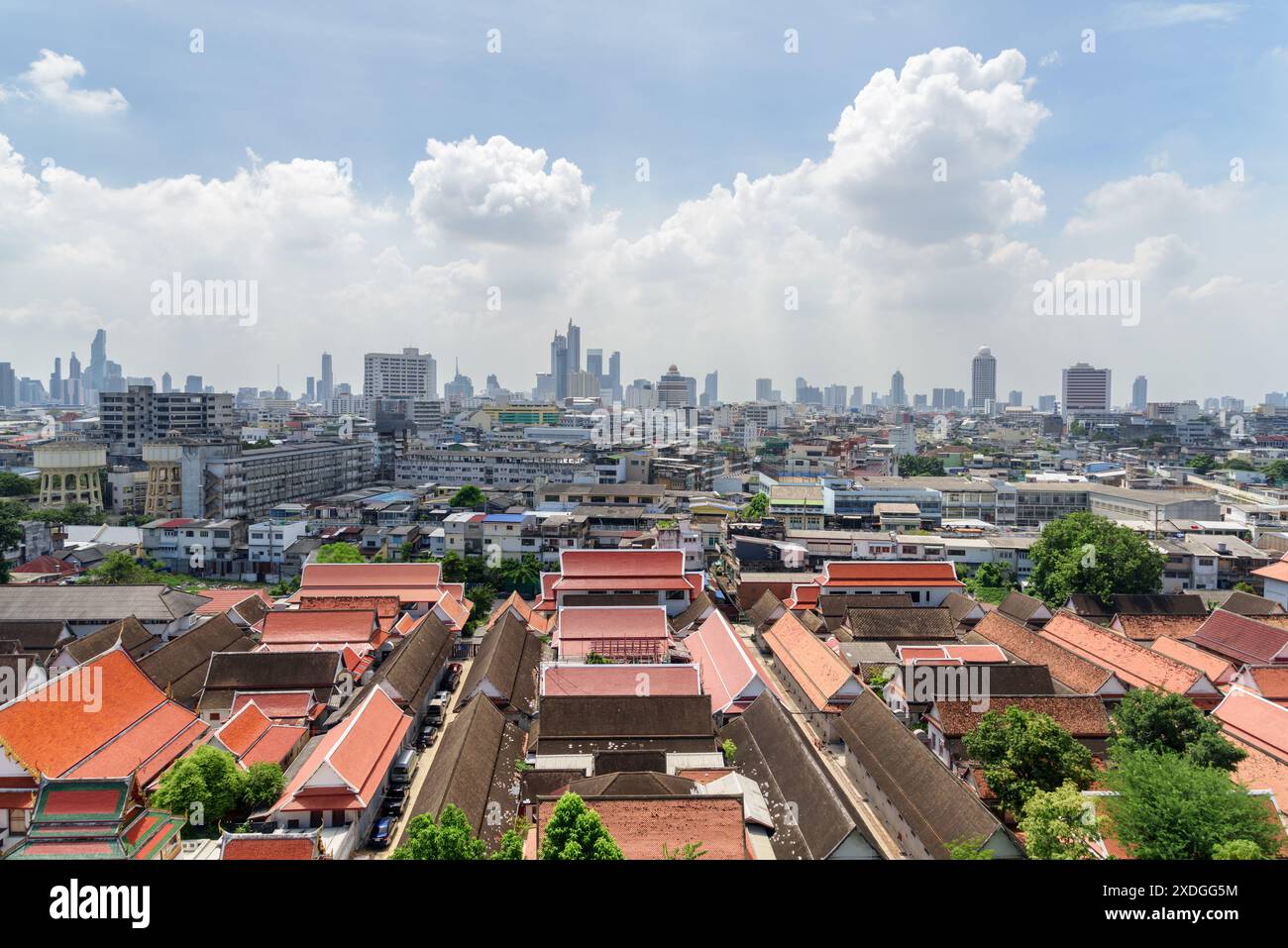Beautiful Bangkok skyline, Thailand. Scenic view of old residential buildings and water towers ...