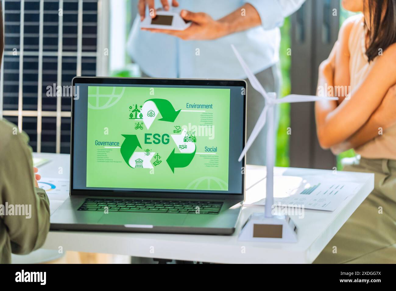 ESG ( environment, social,governance) recycle sign on laptop screen ...