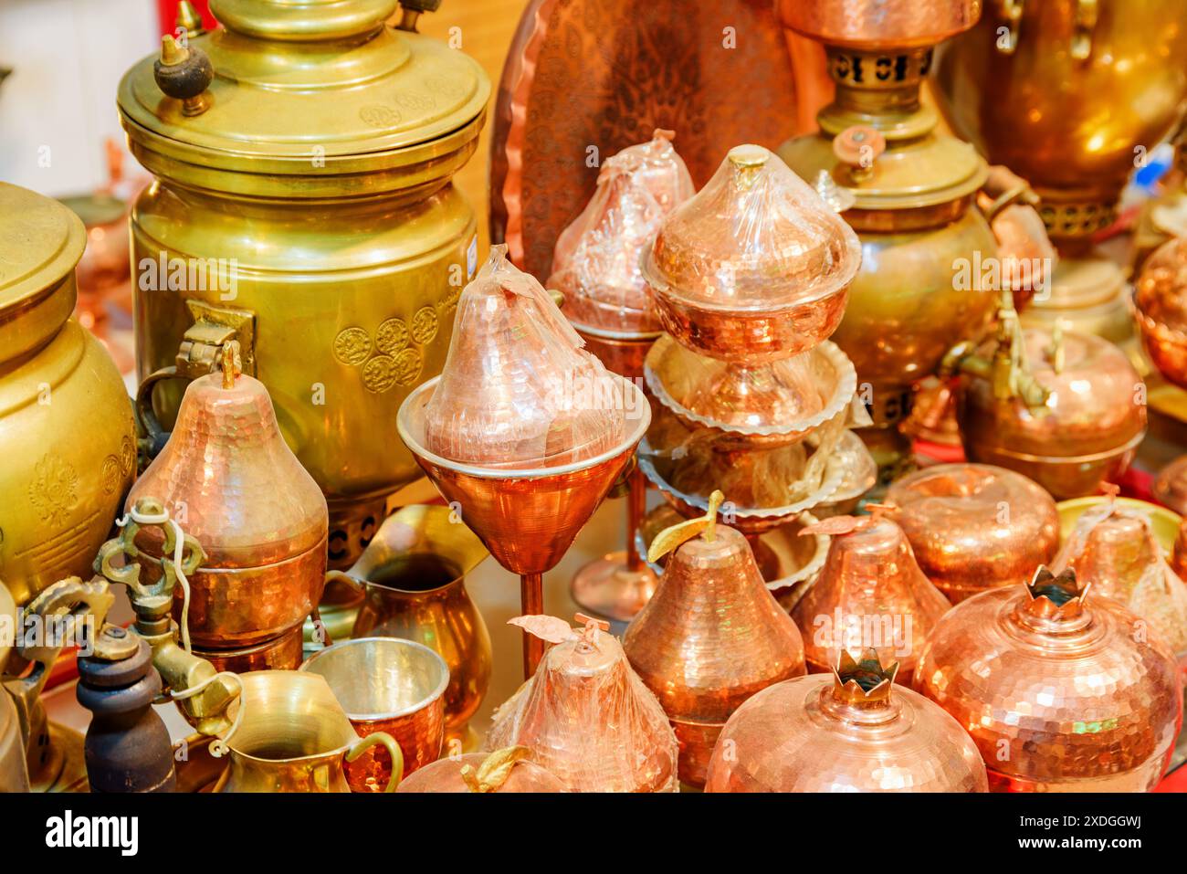 Closeup view of traditional Iranian samovars in souvenir shop. Persian ...