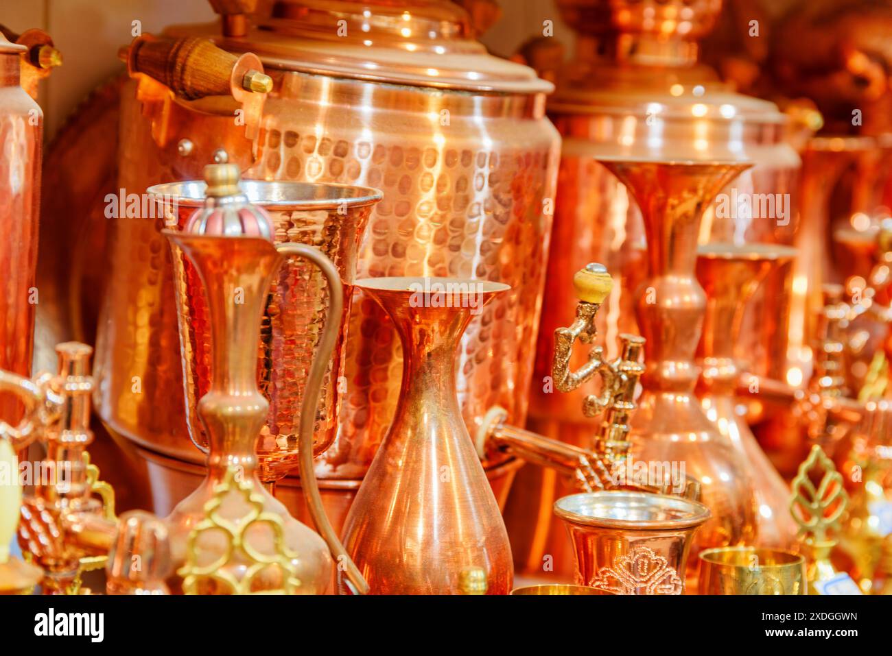 Closeup view of traditional Iranian samovars in souvenir shop. Persian ...