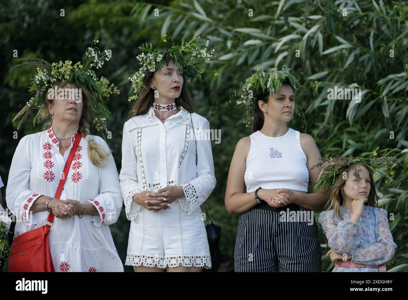 The women participate in a contest for the best outfit at the Kupalle ...