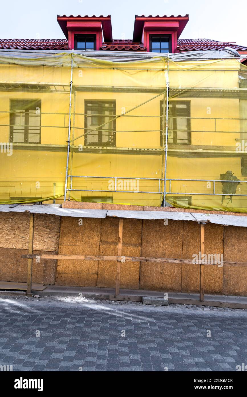 Old Town European Building Reconstruction Site With Scaffolding In An ...