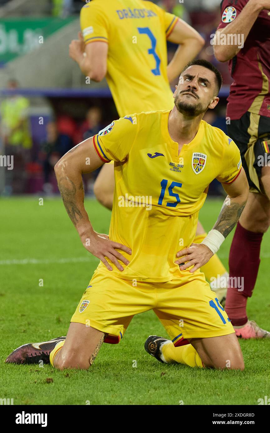 Cologne, Germany. 22nd June, 2024. Andrei Burca of Romania reacts ...