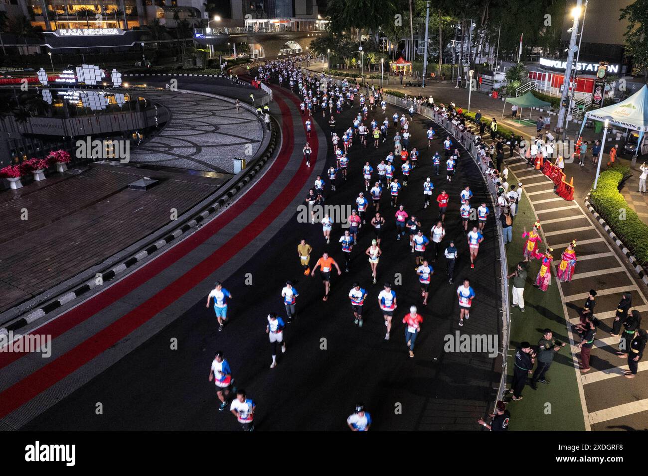 (240623) -- JAKARTA, June 23, 2024 (Xinhua) -- Participants run during ...