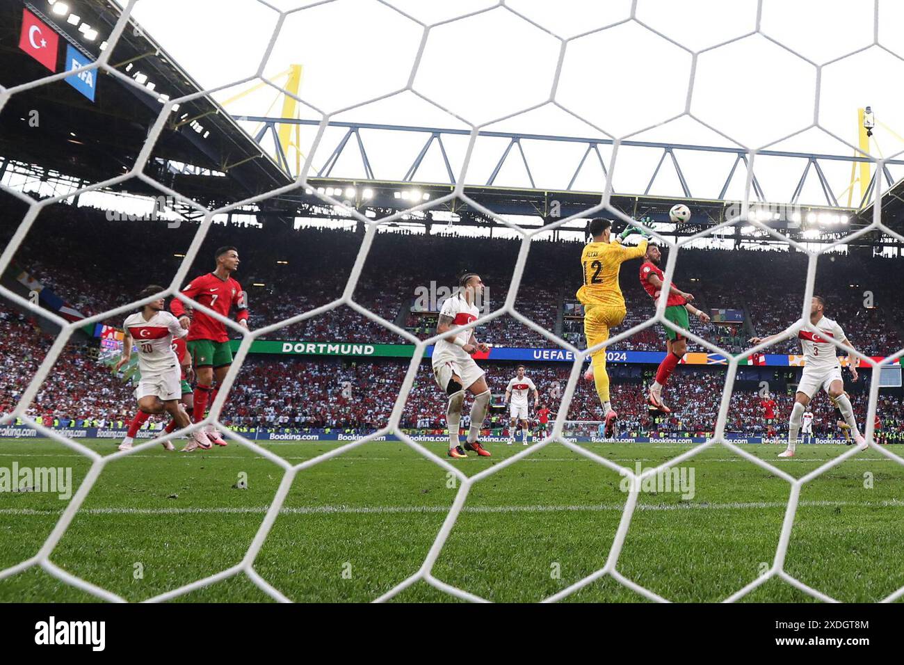 Dortmund. 22nd June, 2024. Bruno Fernandes (2nd R) of Portugal vies for ...