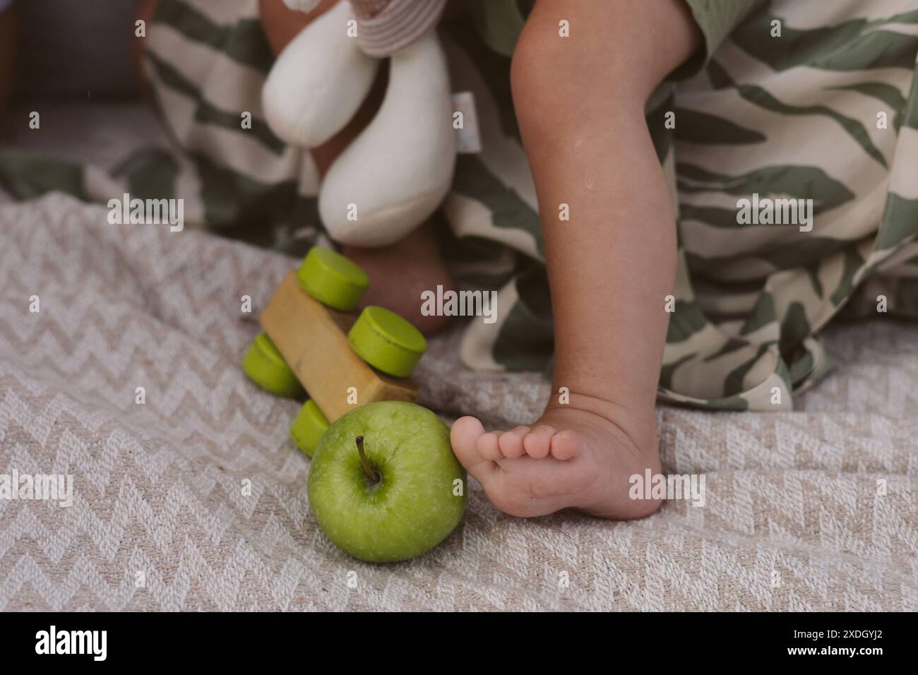 Tiny legs of baby boy Stock Photo - Alamy