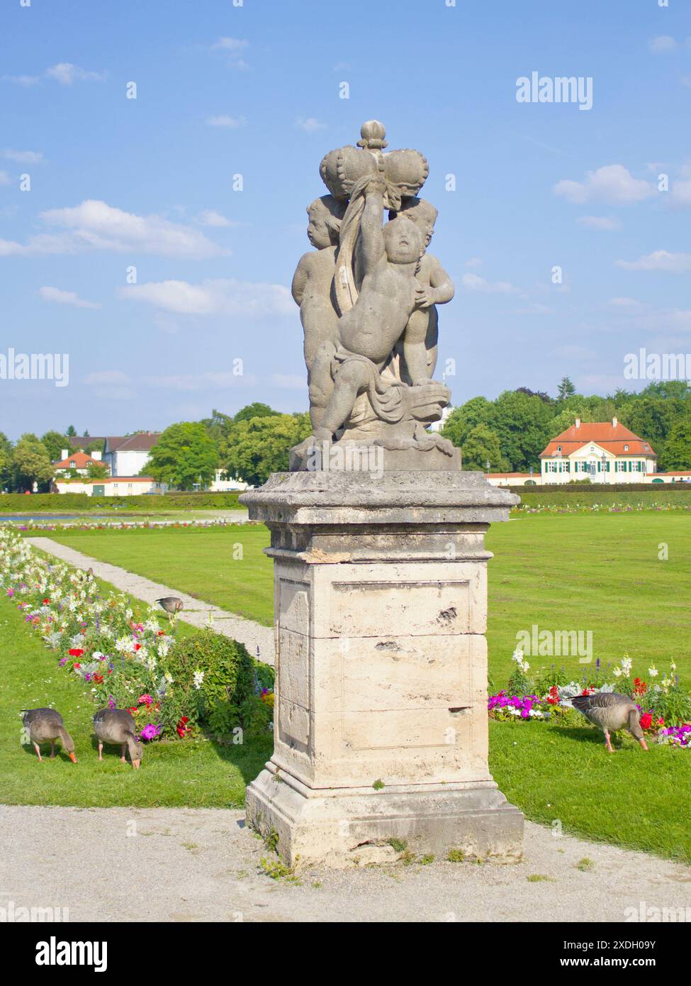 Pictured flying gardeners take care of the lawn in front of the castle ...