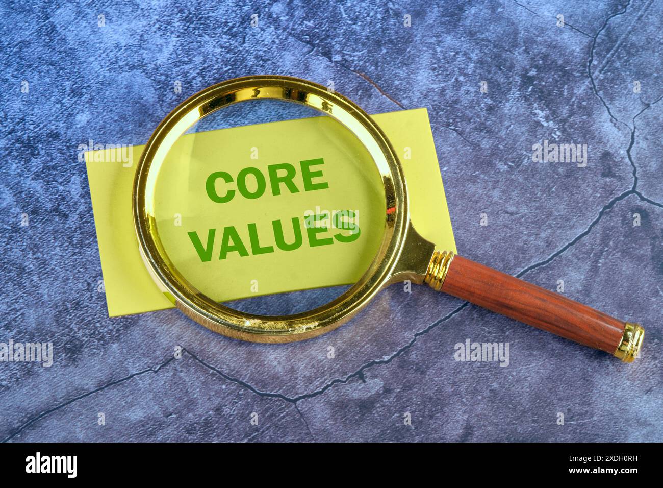 CORE VALUES. ethics concept, text through a magnifying glass to a ...