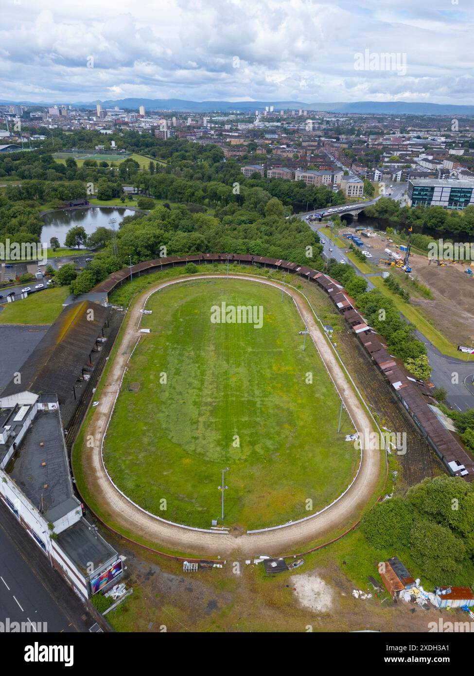 Aerial view of abandoned closed down former greyhound racing rack and ...