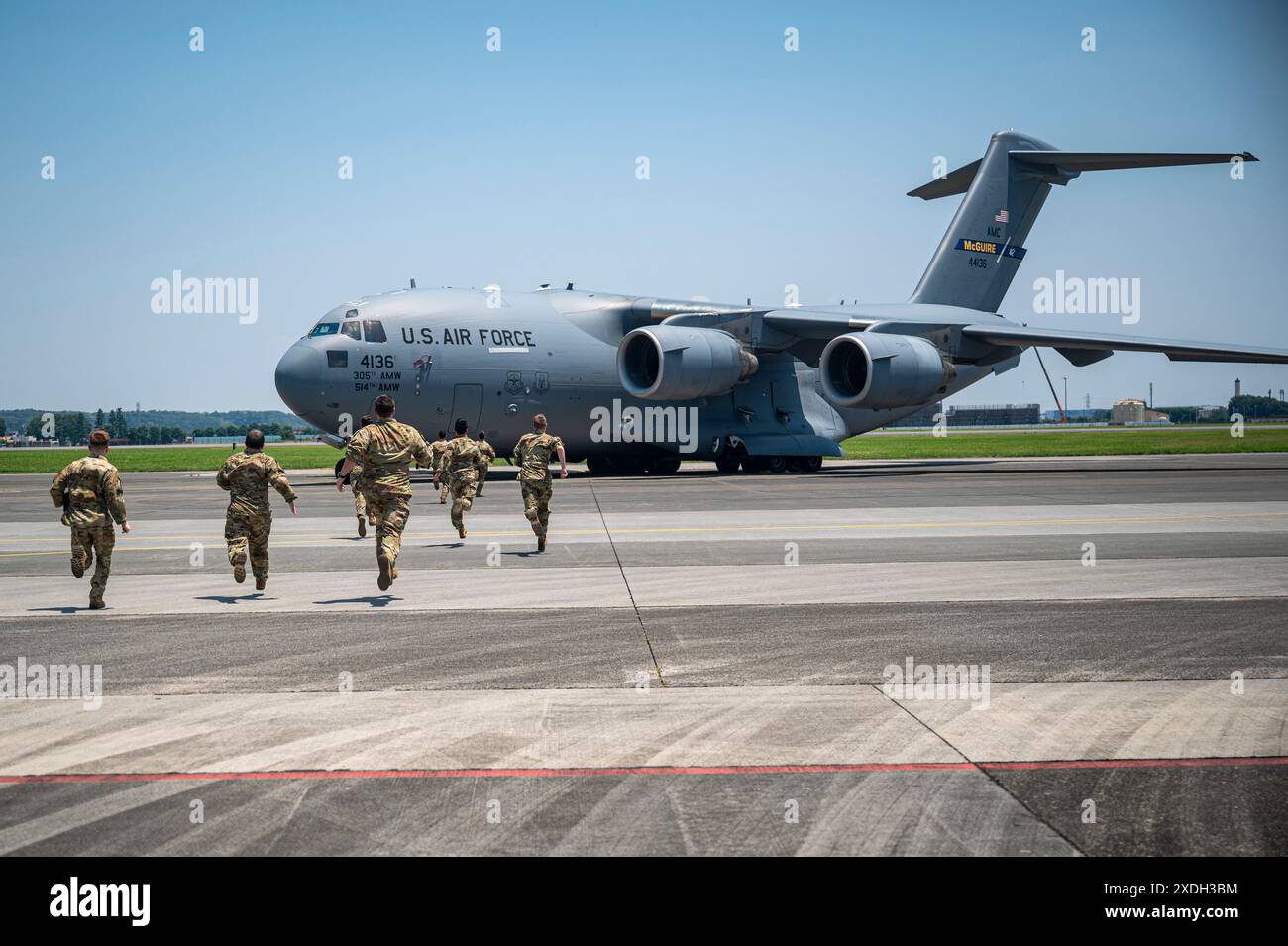 U.S. Air Force aircrew members assigned to the 6th Airlift Squadron run ...
