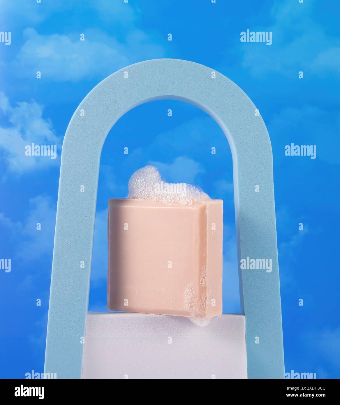 Bright, modern pastel soap bar with bubbles against a blue sky backdrop ...