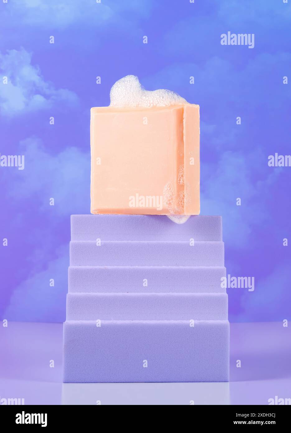Trendy pastel soap bar with foam in a modern setting, purple sky ...