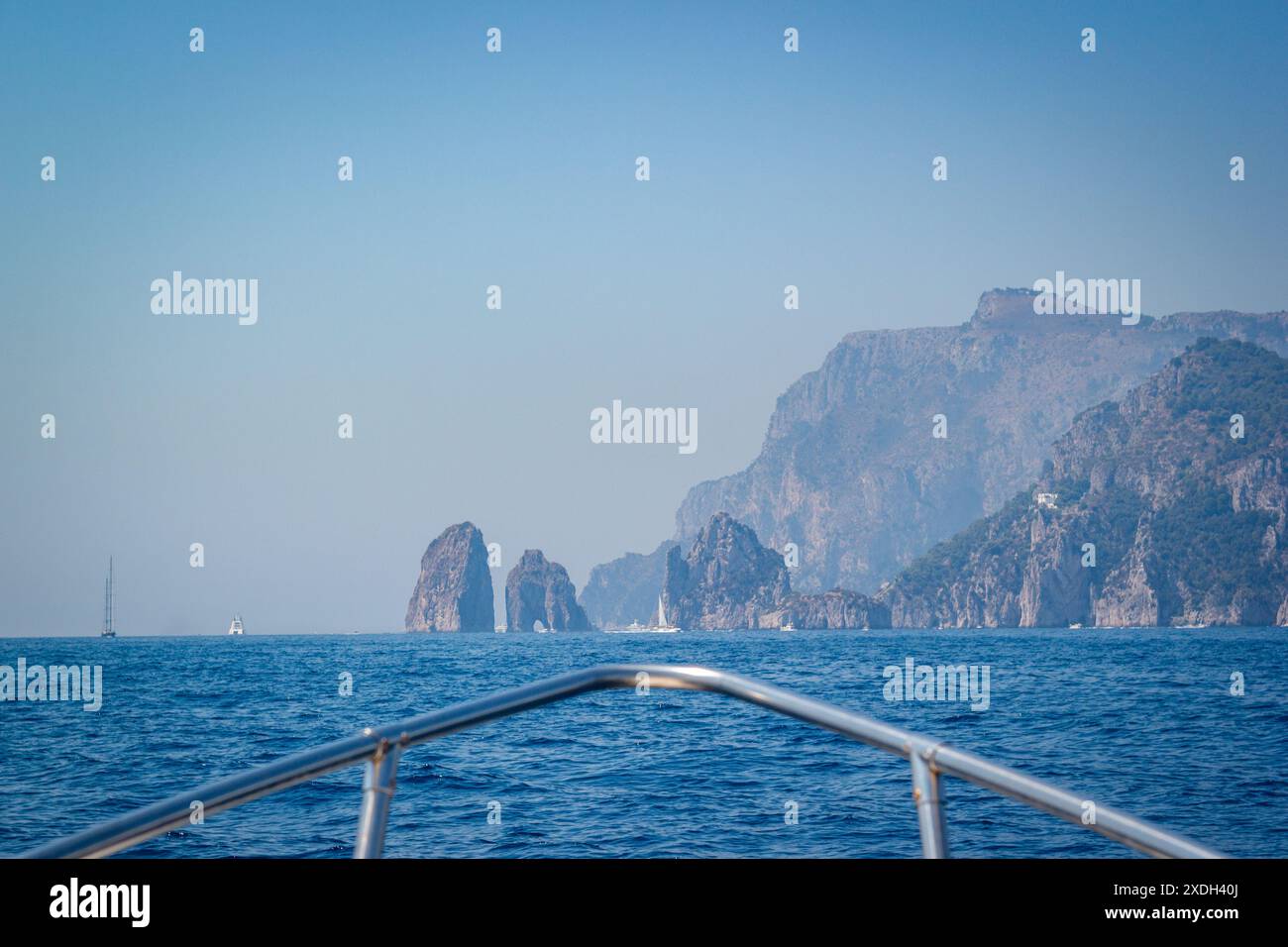 Sailing to famous Faraglioni rocks in Capri island, Italy Stock Photo ...